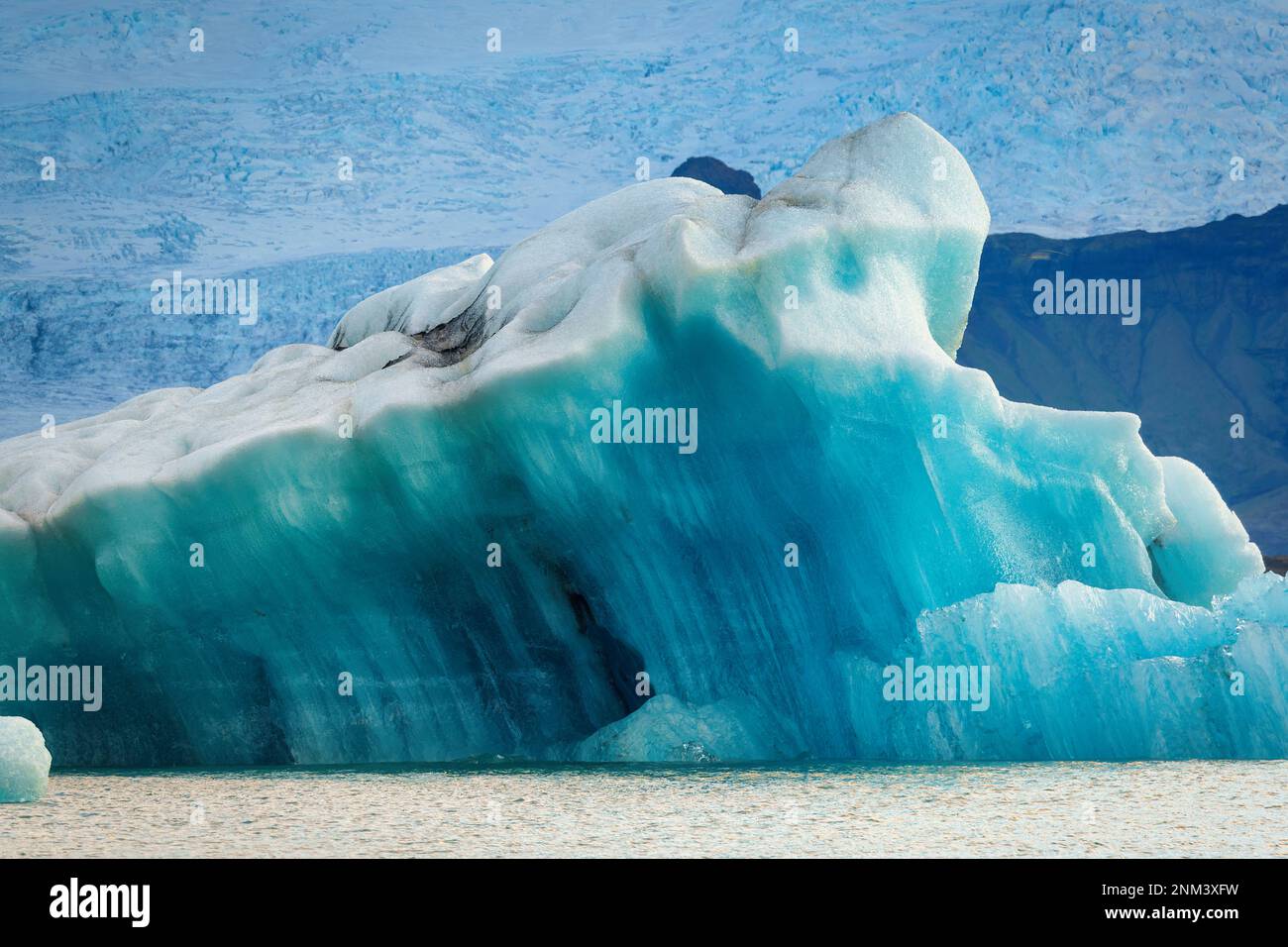 Beautiful abstract pattern of blue iceberg melting and floating in ...