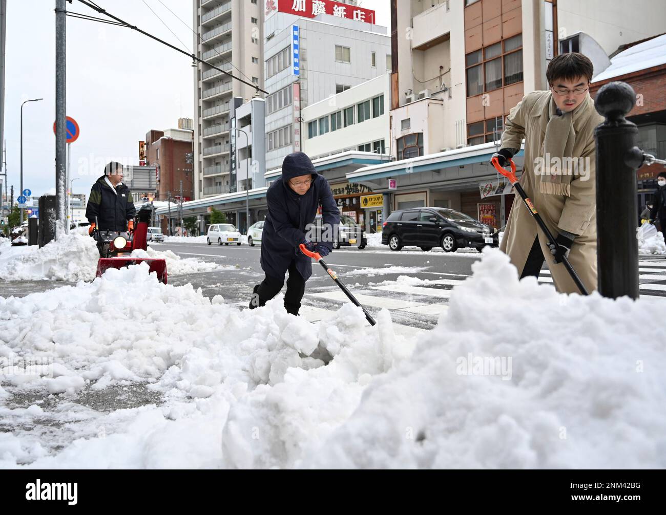 The heavy snow falls at a street in Tottori City, Tottori Prefecture ...