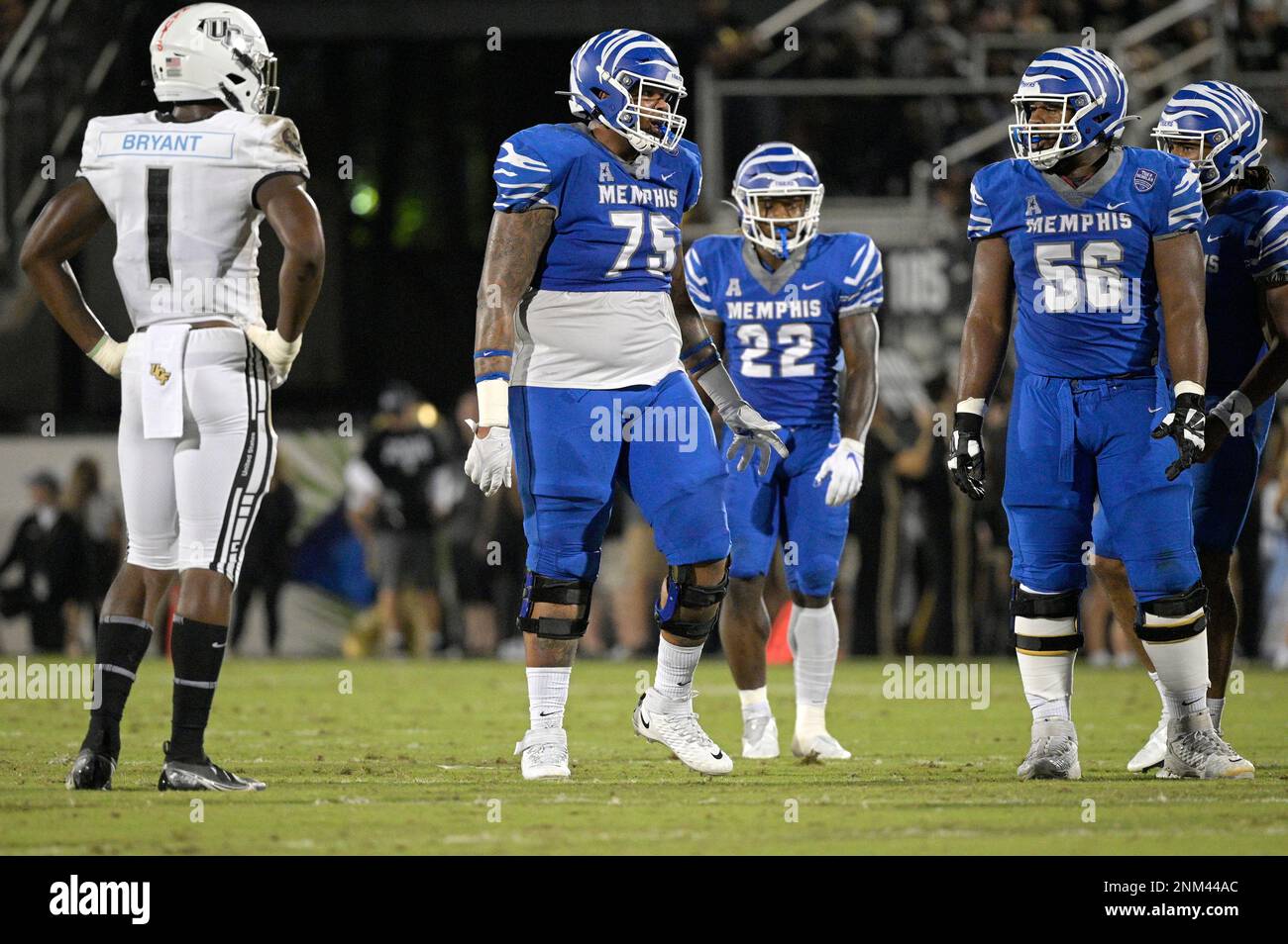 Memphis offensive lineman Matt Dale (75) and offensive lineman Dylan ...
