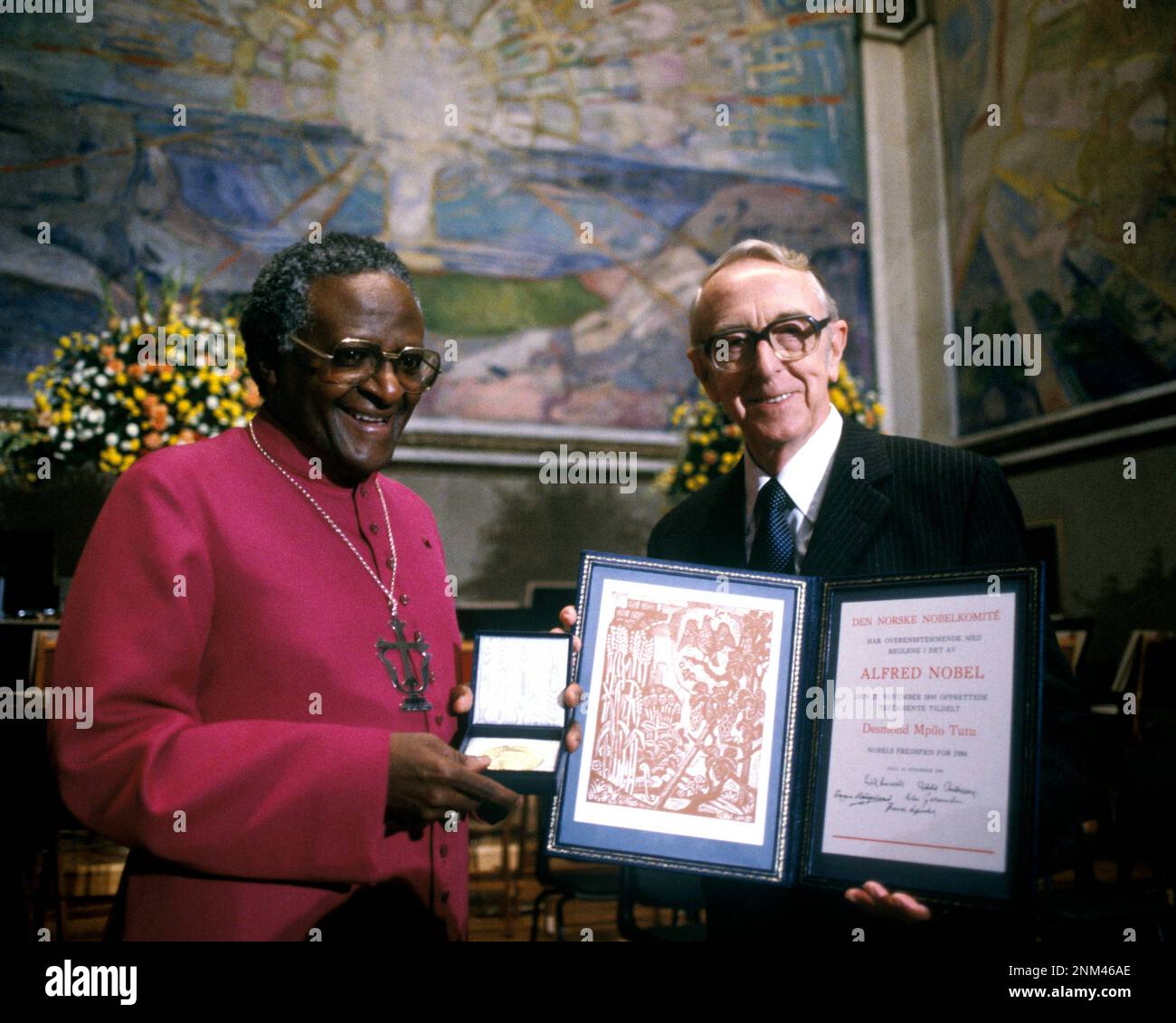FILE - South Africa Bishop Desmond Tutu, left, is presented with the ...