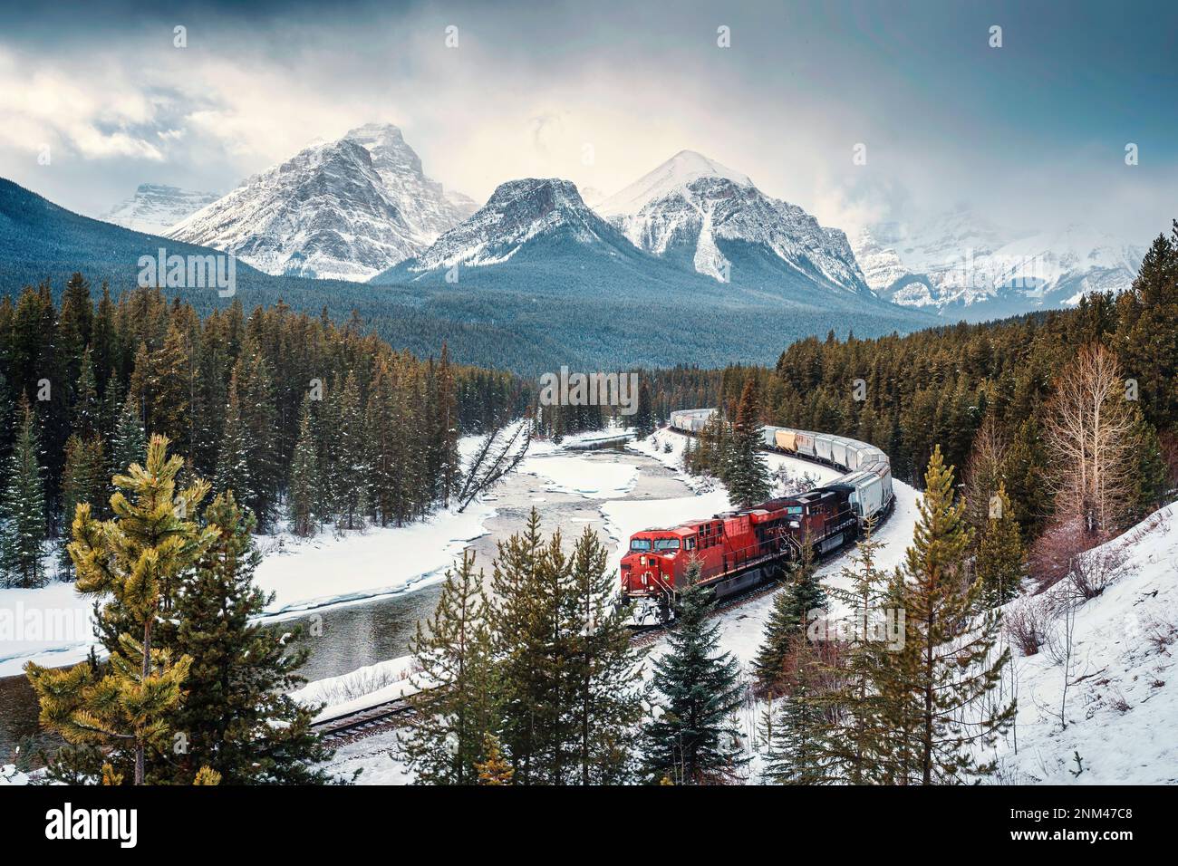 Viewpoint of Morants Curve with iconic red cargo train passing through ...