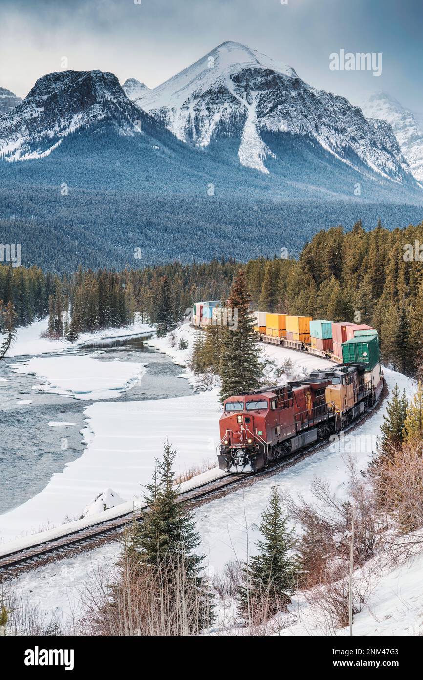 Viewpoint of Morants Curve with iconic red cargo train passing through ...