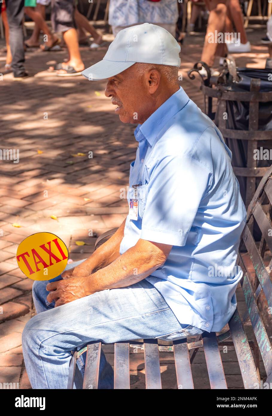 Local taxi driver holding sign, Columbus Park (Parque Colón), Santo ...