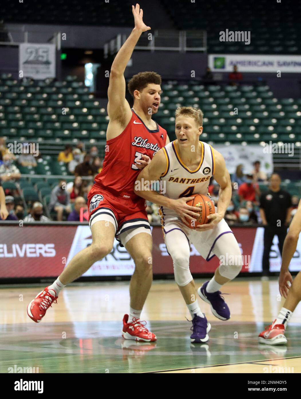 December 22, 2021 - Northern Iowa Panthers guard AJ Green #4 drives the ...