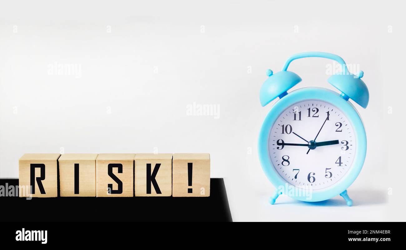 Wooden cubes with the word risk. Risk taking, risk management or ...