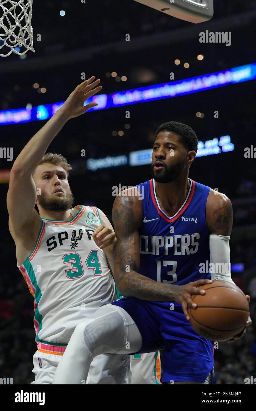 LOS ANGELES, CA - DECEMBER 20: San Antonio Spurs center Jock Landale (34) guards LA Clippers ...