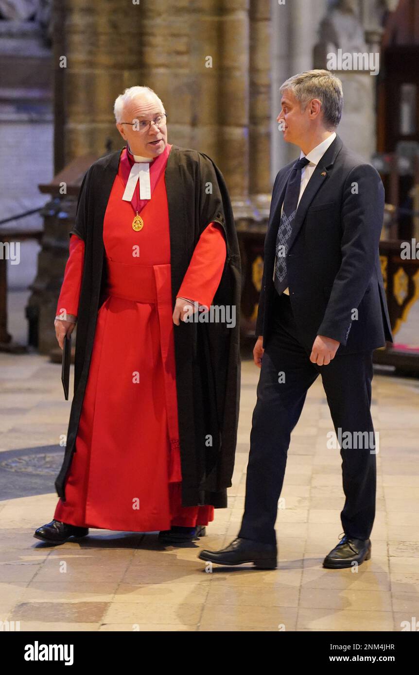 The Dean of Westminster David Hoyle walks with the Ukrainian Ambassador ...