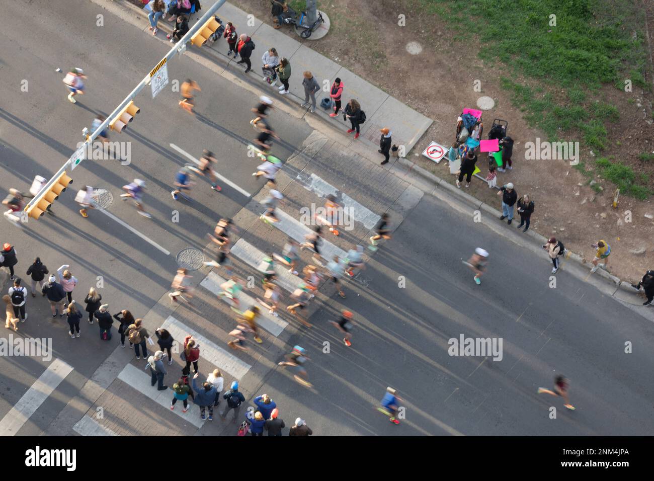 Overhead view of Austin marathon runners on Cesar Chavez Avenue in ...