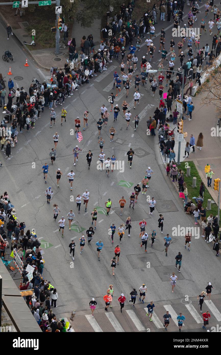 Austin Marathon runners coming off First Ave Bridge in Texas Stock ...
