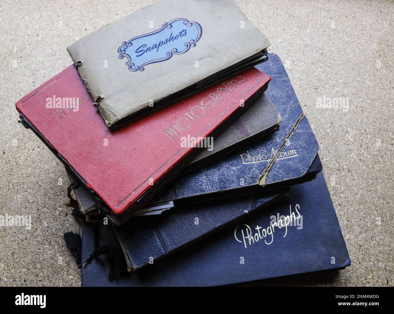 Memories are made of this. A pile of vintage photograph albums. A store ...