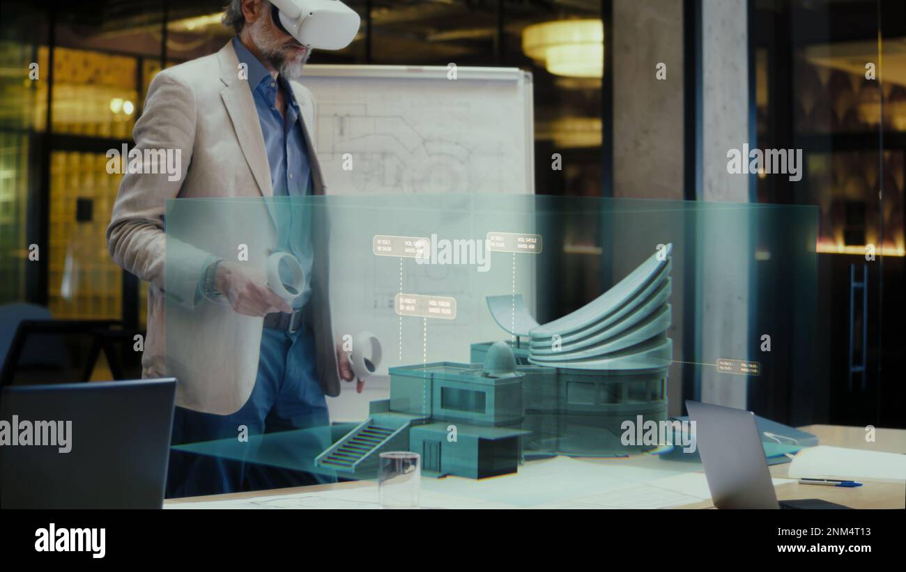 Architect designer in VR goggles presents new architecture project in ...