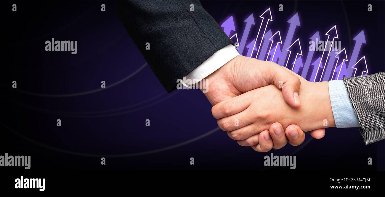 Handshake presenting innovative plan ideas symbolizing successful ...