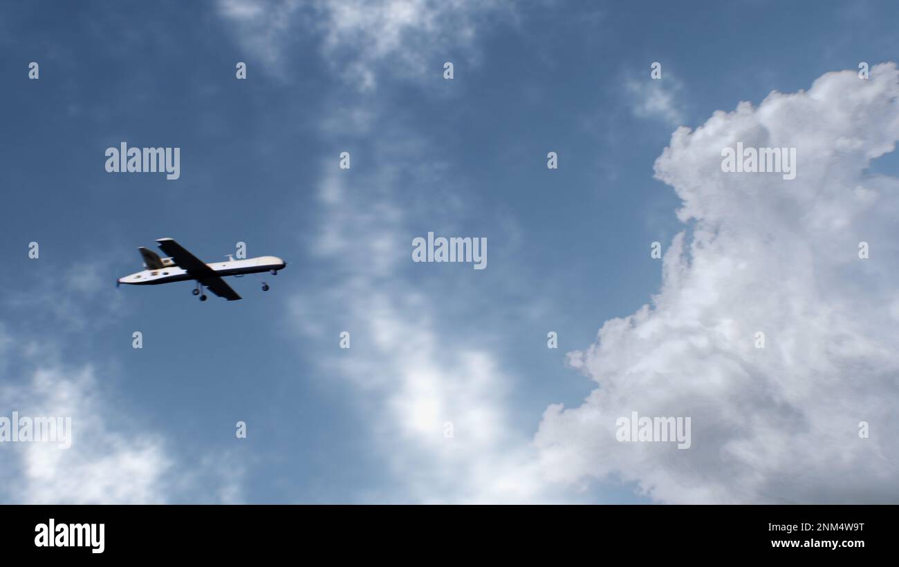 3D animation of military drone flight. Combat drone on military mission ...