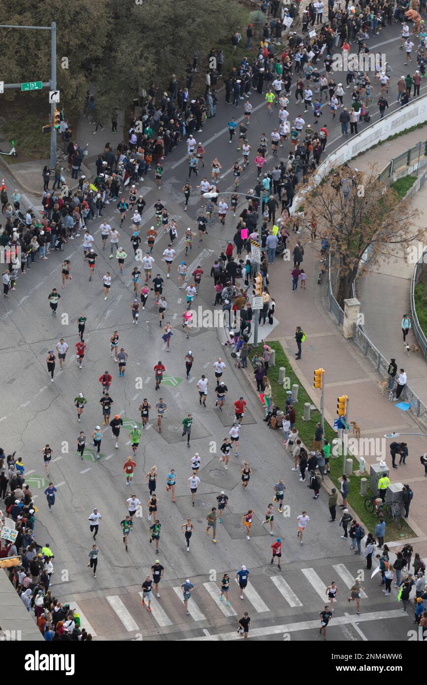 Austin Marathon runners coming off First Ave Bridge in Texas Stock ...