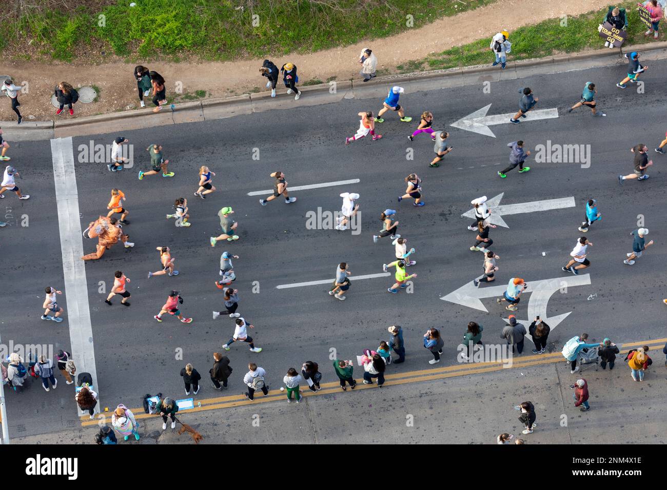 Overhead view of Austin marathon runners on Cesar Chavez Avenue in ...