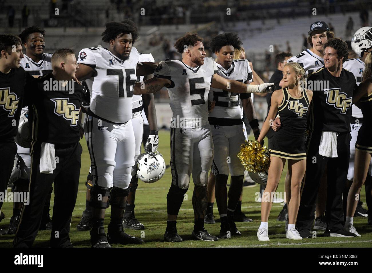 Central Florida offensive lineman Adrian Medley (76) and running back ...
