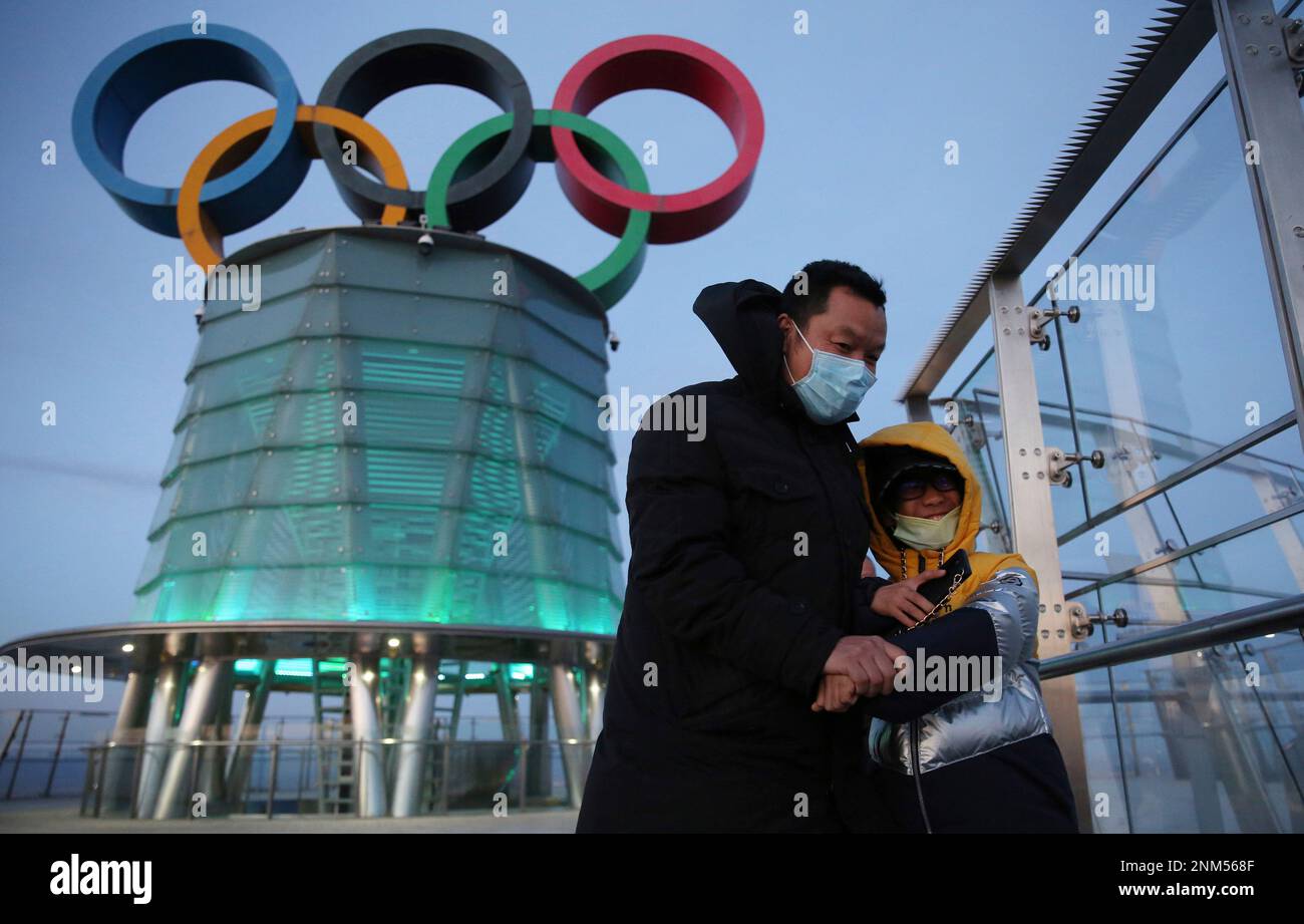 People visit the Olympic Tower at the Olympic park in Beijing, China ...