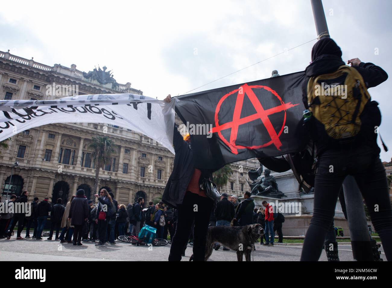 Rome, Italy. 24th Feb, 2023. A group of anarchists hang a banner with ...