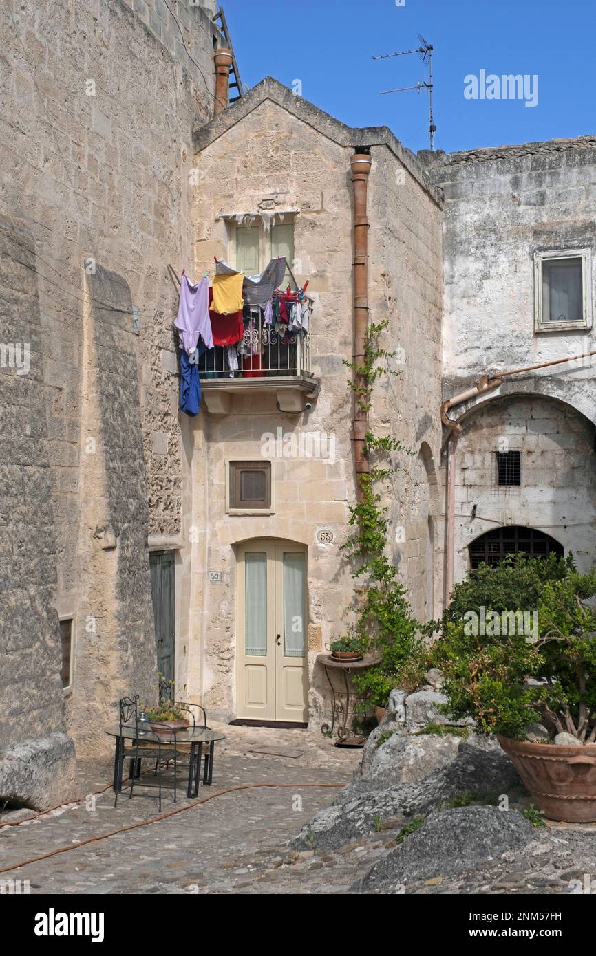 Laundry drying from balcony in the Sassi di Matera complex of cave ...