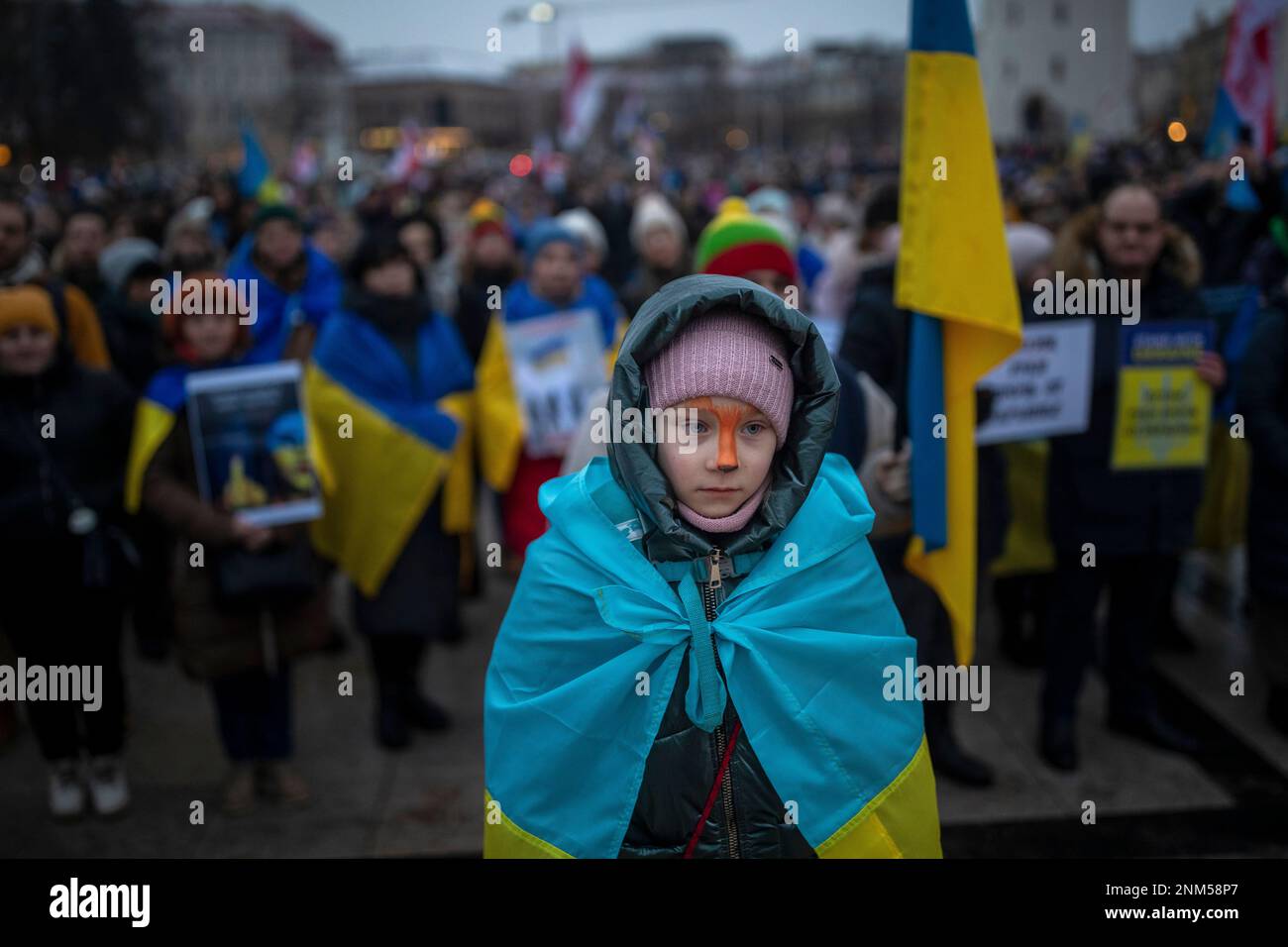 People attend a demonstration against Russia's war on Ukraine to mark ...