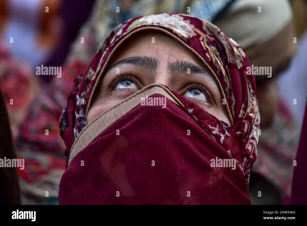 Srinagar, India. 24th Feb, 2023. A Kashmiri Muslim devotee prays upon ...