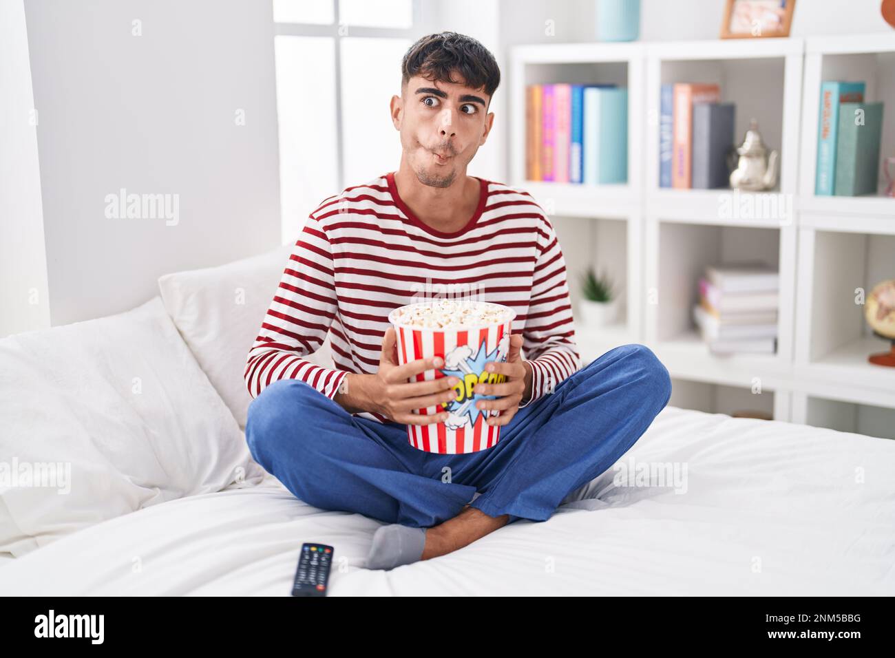 Silly man eating snack food hi-res stock photography and images - Alamy