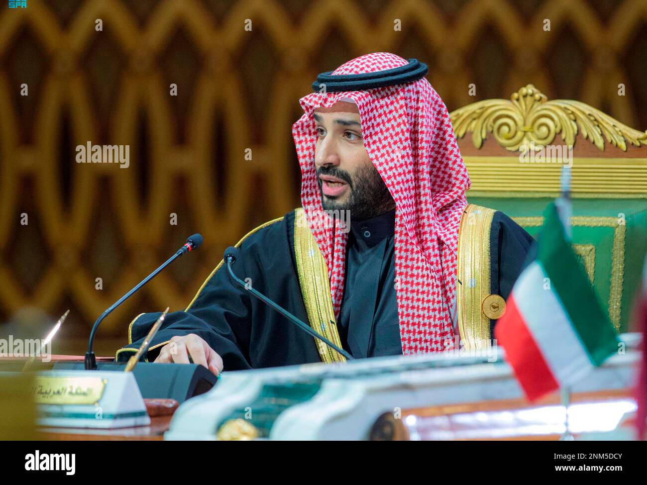 In this photo released by Saudi Royal Palace, Saudi Crown Prince ...