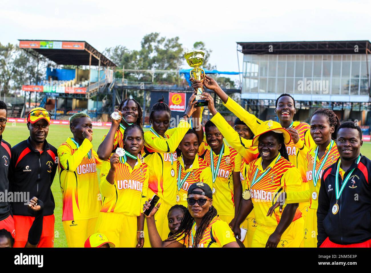 Uganda players celebrate lifting the Trophy after beating Kenya during ...