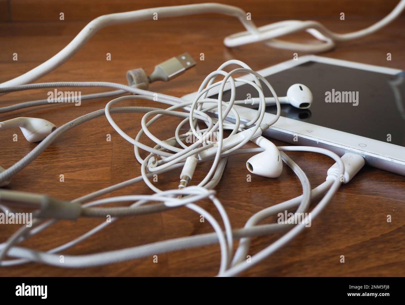 Cable clutter in daily life. Communications consept background. Digital ...