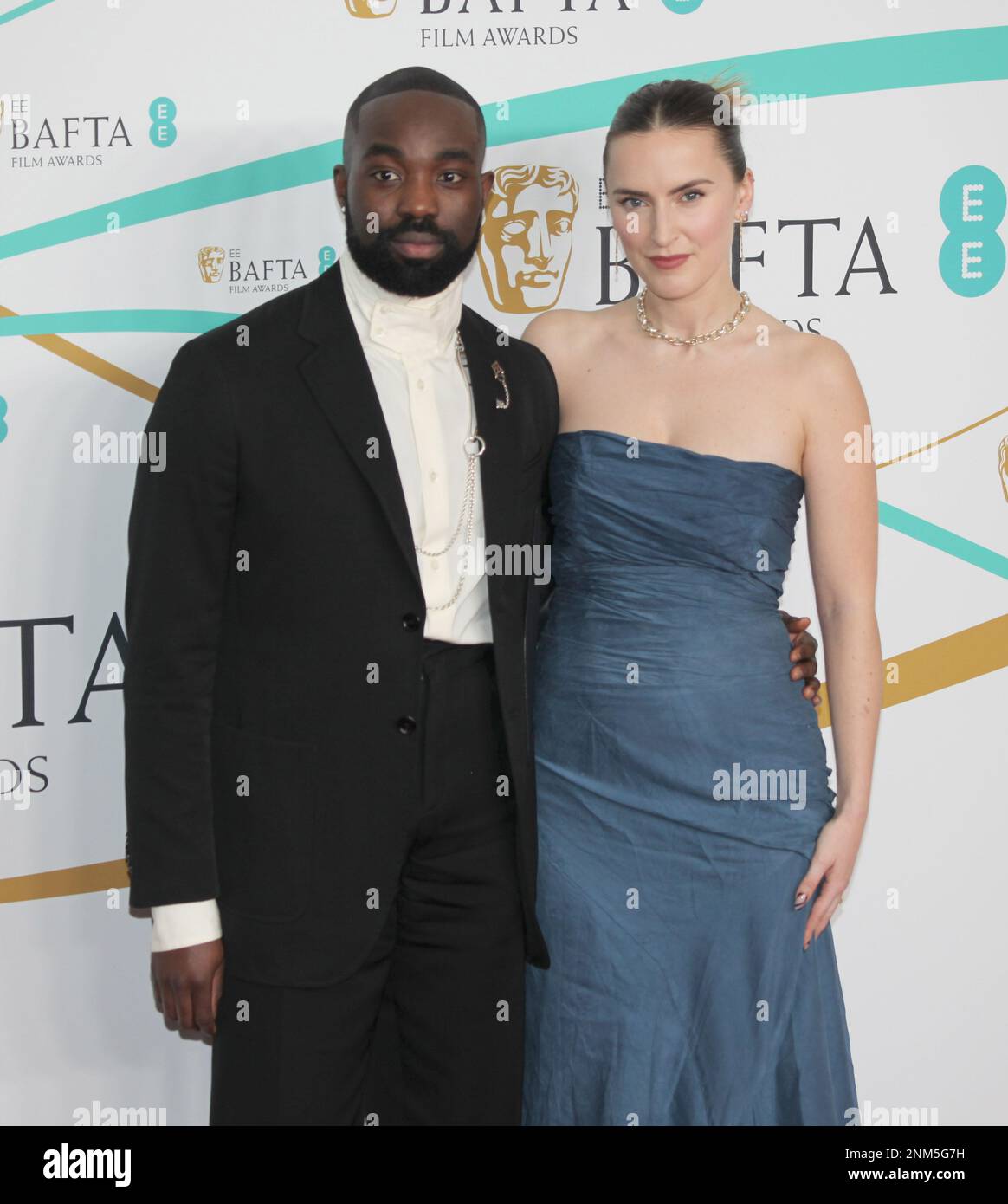 London, UK. Paapa Essiedu and Rosa Robson (right) at the EE BAFTA Film ...