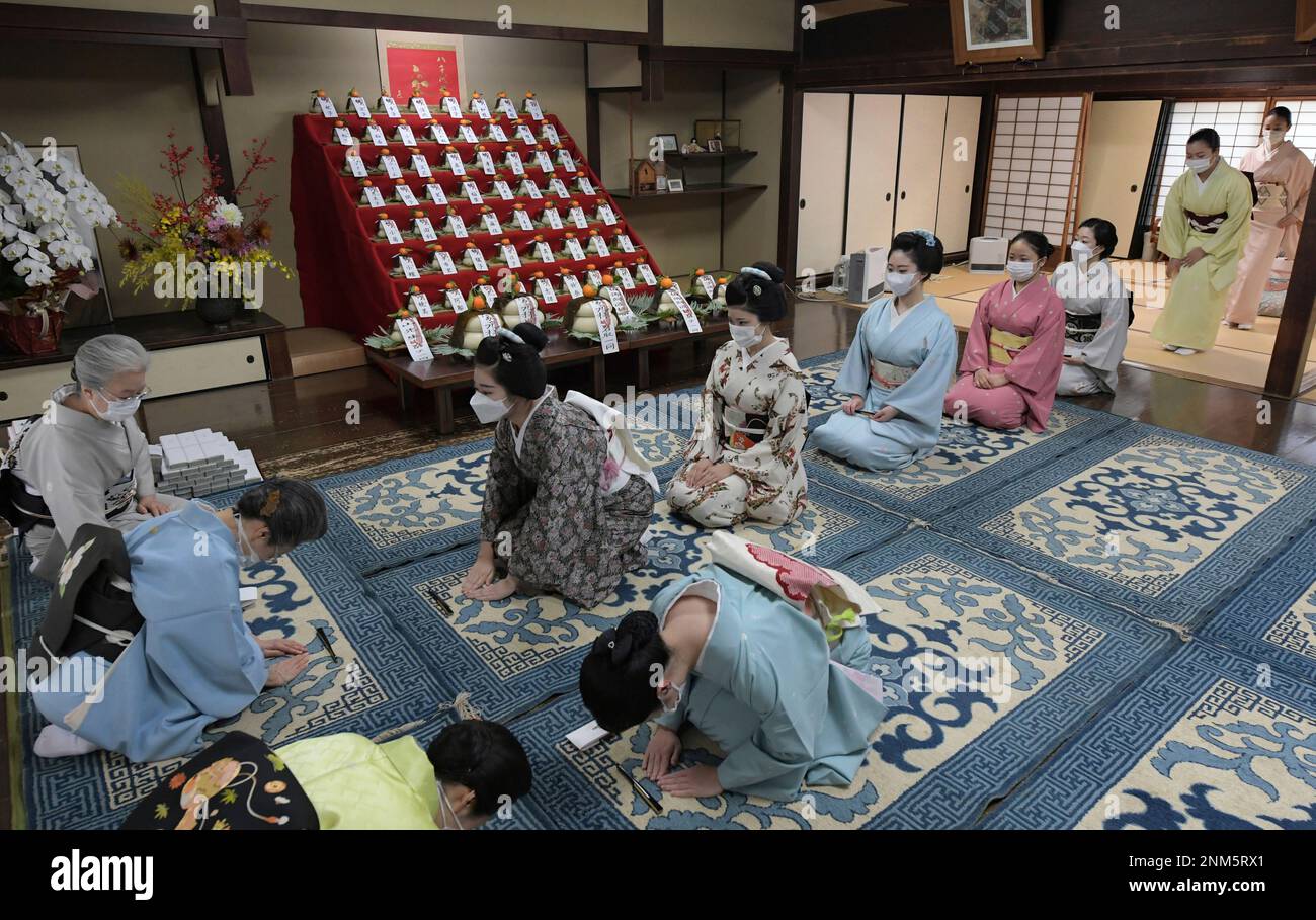 Maiko and Geiko call on their dance teacher Yachiyo Inoue (L) to offer ...