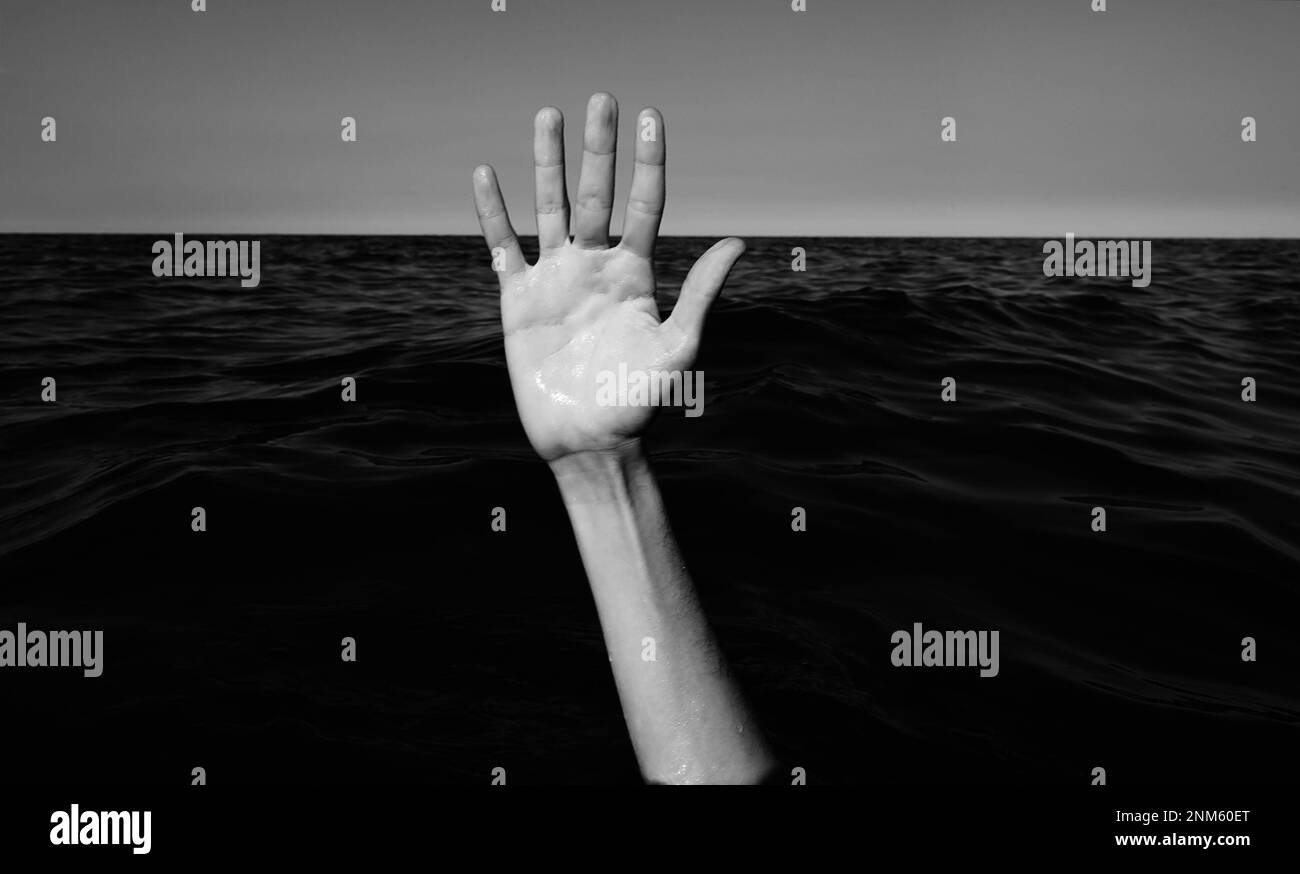 people hand while drowning and asking for help symbol of depression and ...