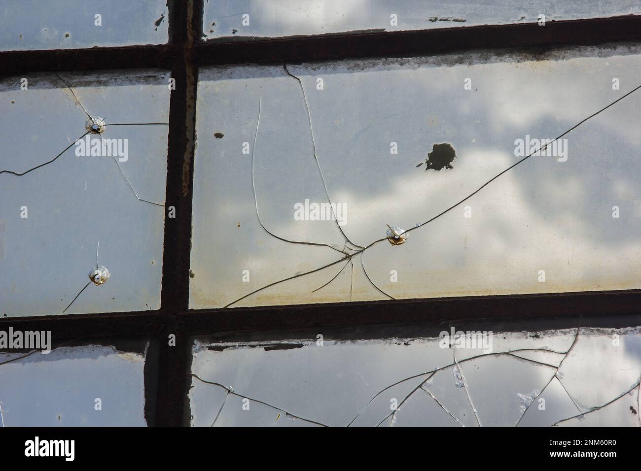 broken glass in the window. background sky, danger, devastation Stock ...