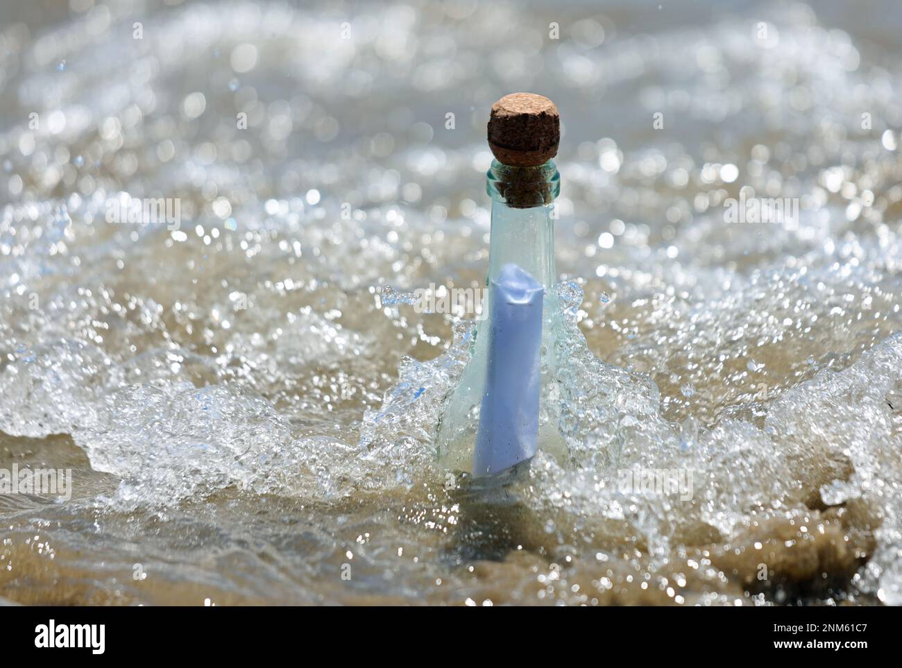 bottle of glass with secret message inside and waves of ocean Stock ...