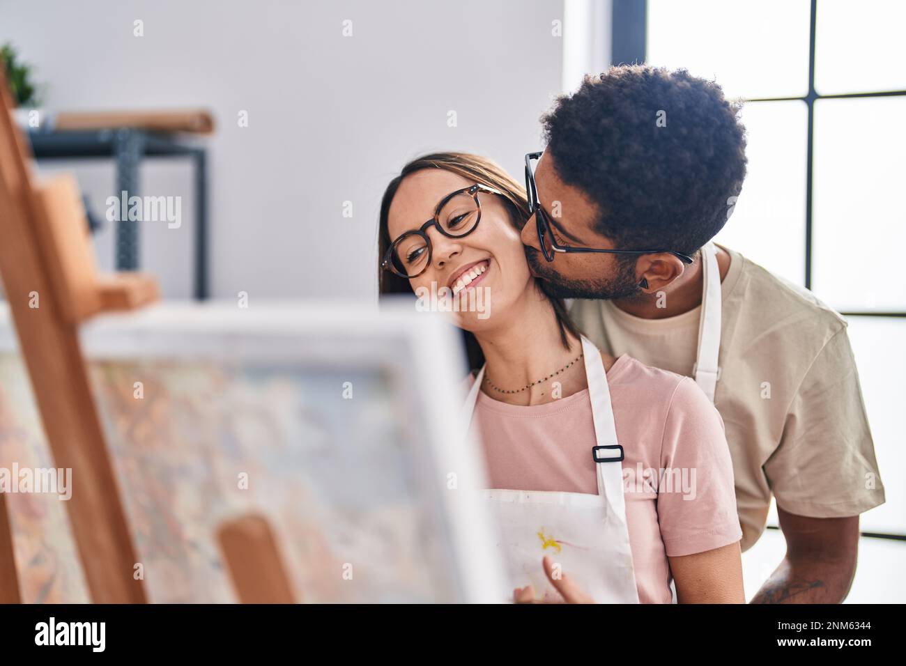 Man and woman couple smiling confident drawing at art studio Stock ...