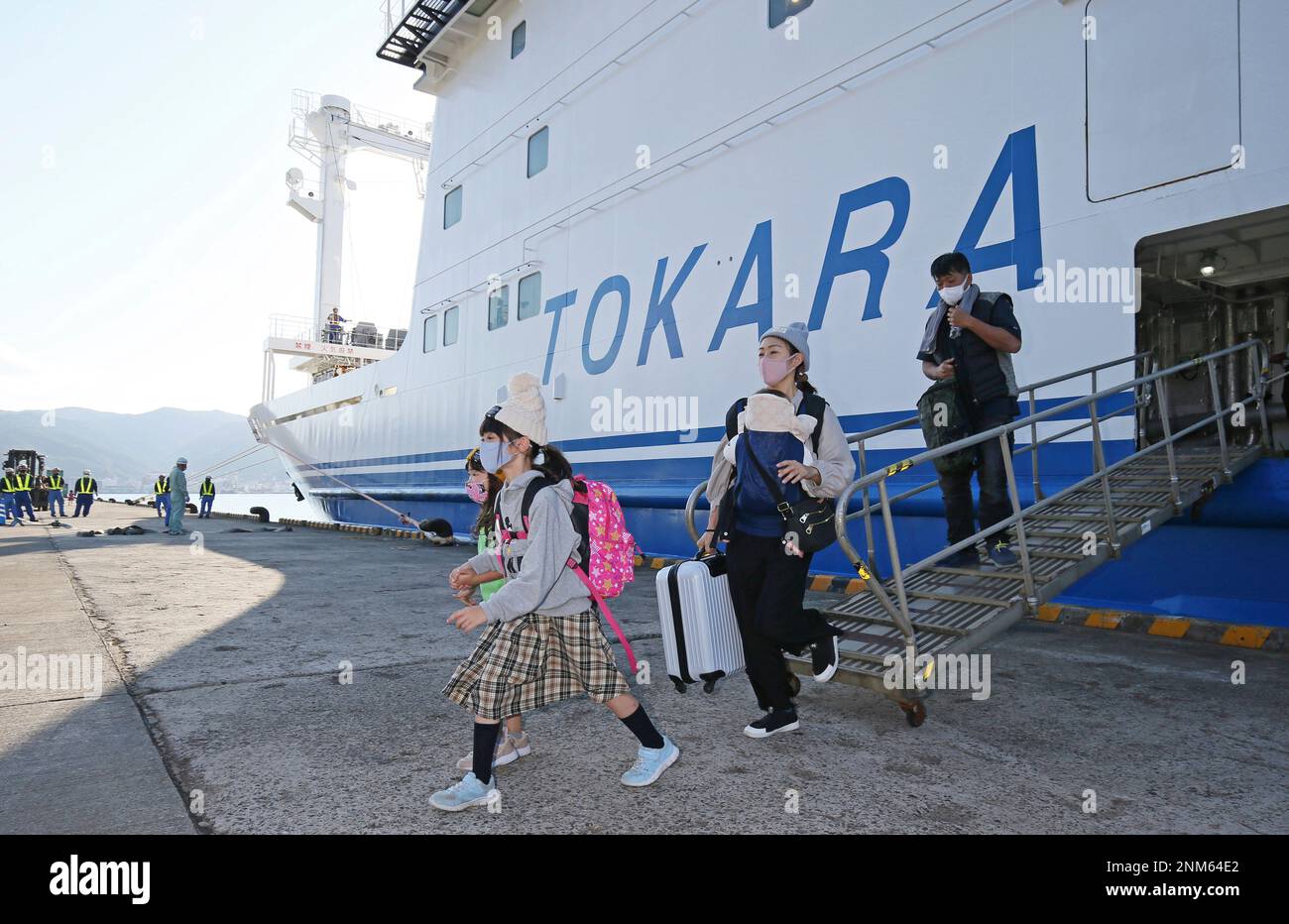 Local resident who live in Akusekijima Island arrive at Naze Port by ...