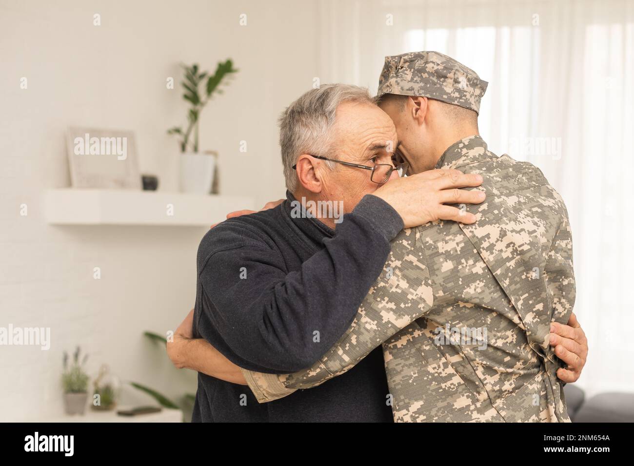an elderly father and a military son Stock Photo - Alamy