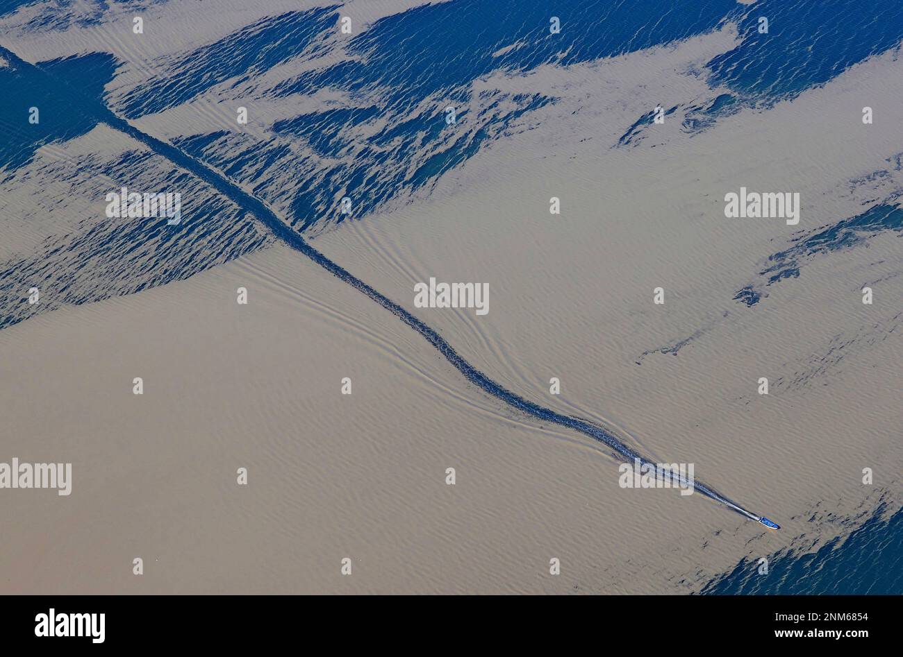 An aerial photo shows a large volume of volcanic pumice stones floating ...