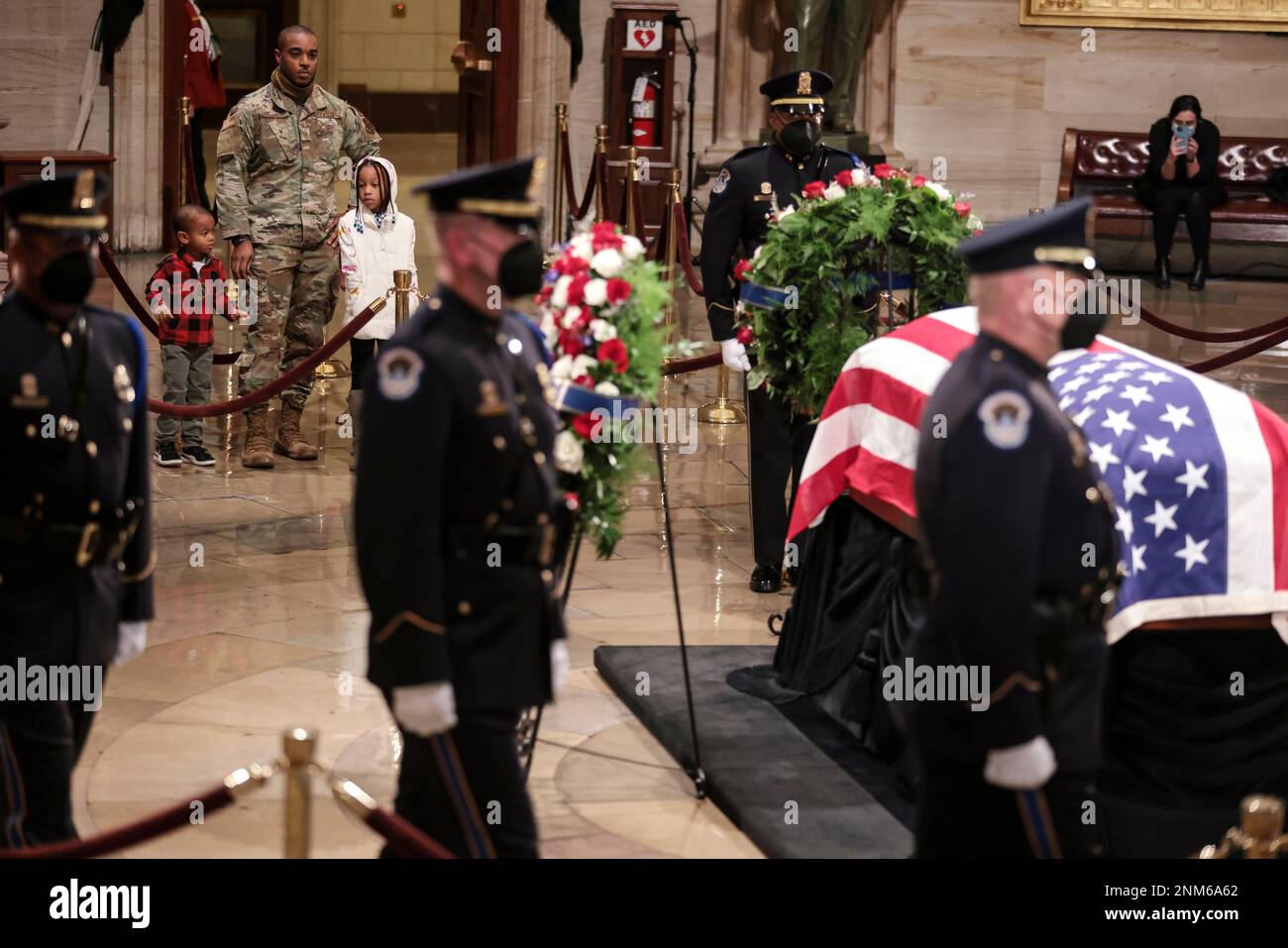 People pay their respects to former Sen. Bob Dole of Kansas as he lies ...