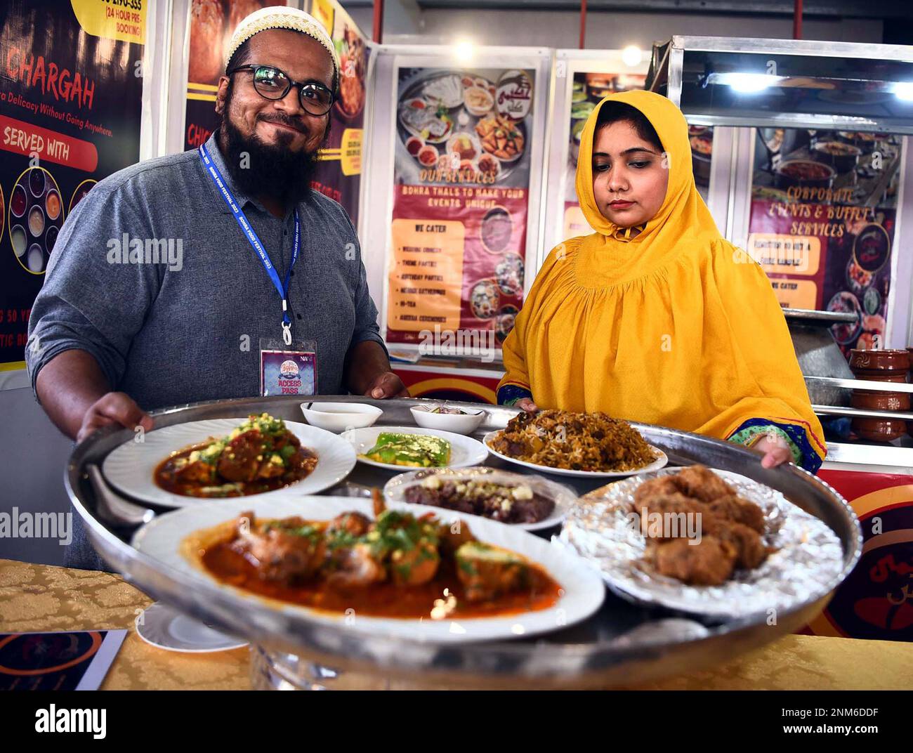 Visitors take keen interest at stall during the Bohra Food Festival ...
