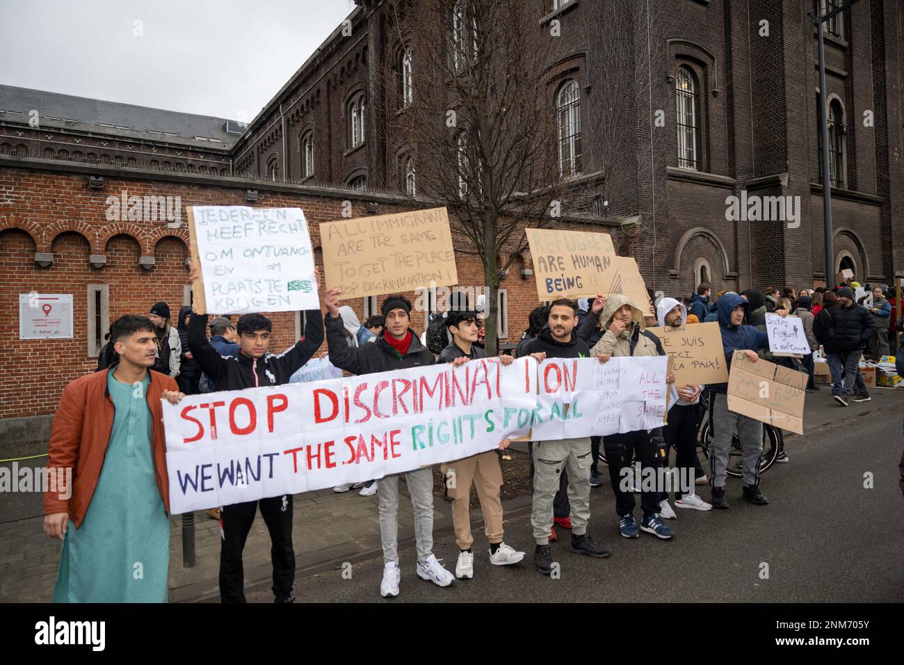 Brussels, Belgium. 24th Feb, 2023. Illustration shows people holding up ...