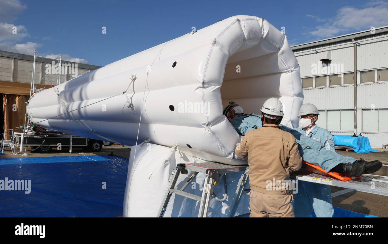 A demonstration of the 13-meter-long air tube type bridge is heled in ...