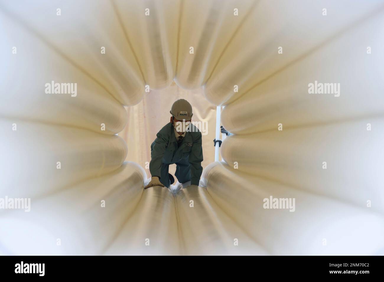 A demonstration of the 13-meter-long air tube type bridge is heled in ...