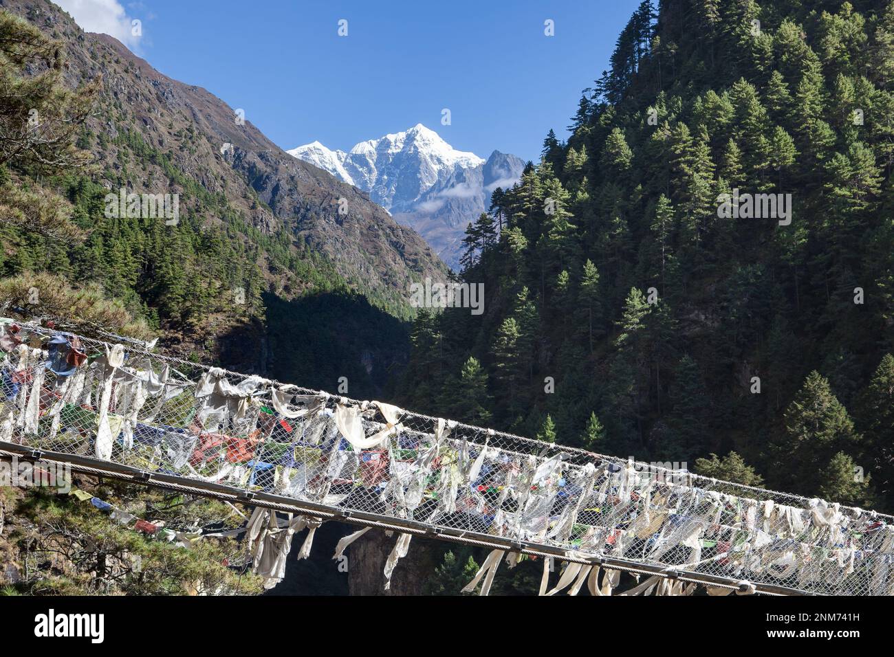 Suspension bridge over the mountain gorge in Sagarmatha National Park ...