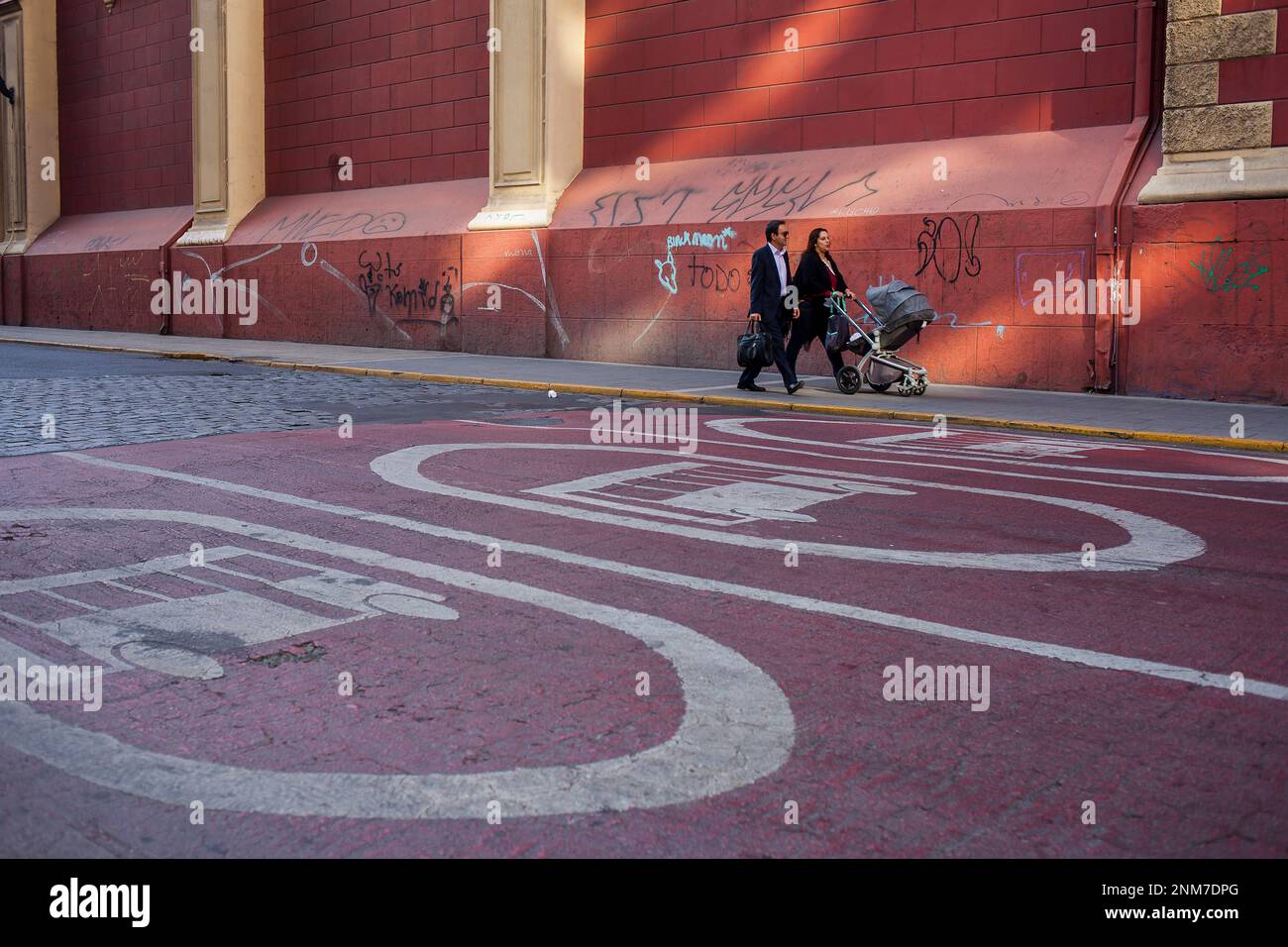 Street scene in Merced street, facade of Basilica de la Merced ...
