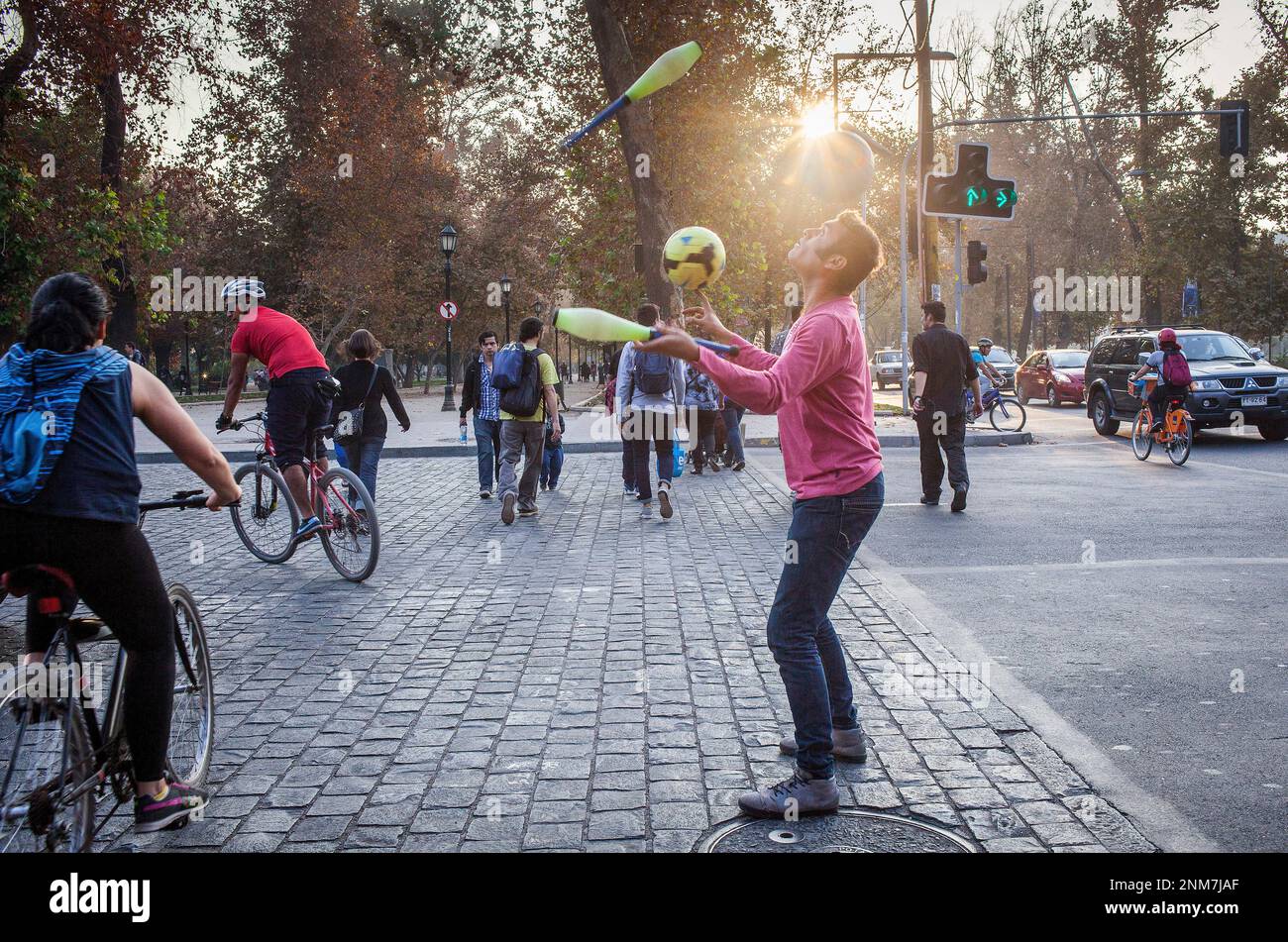 Juggler, street artist in semaphore, Santa Lucia Street, Parque ...