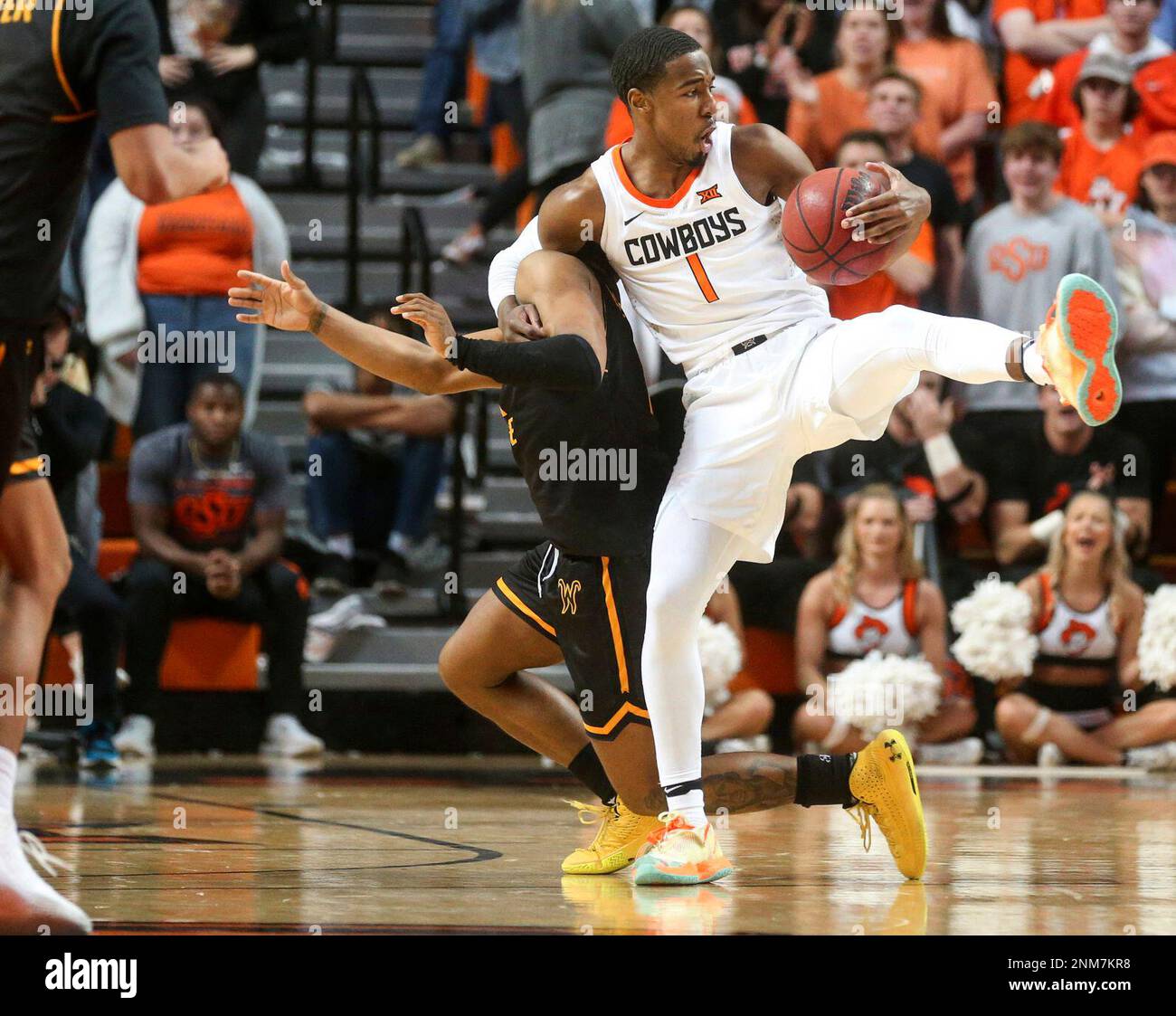 Oklahoma State guard Bryce Thompson (1) gets tangled up with Wichita ...