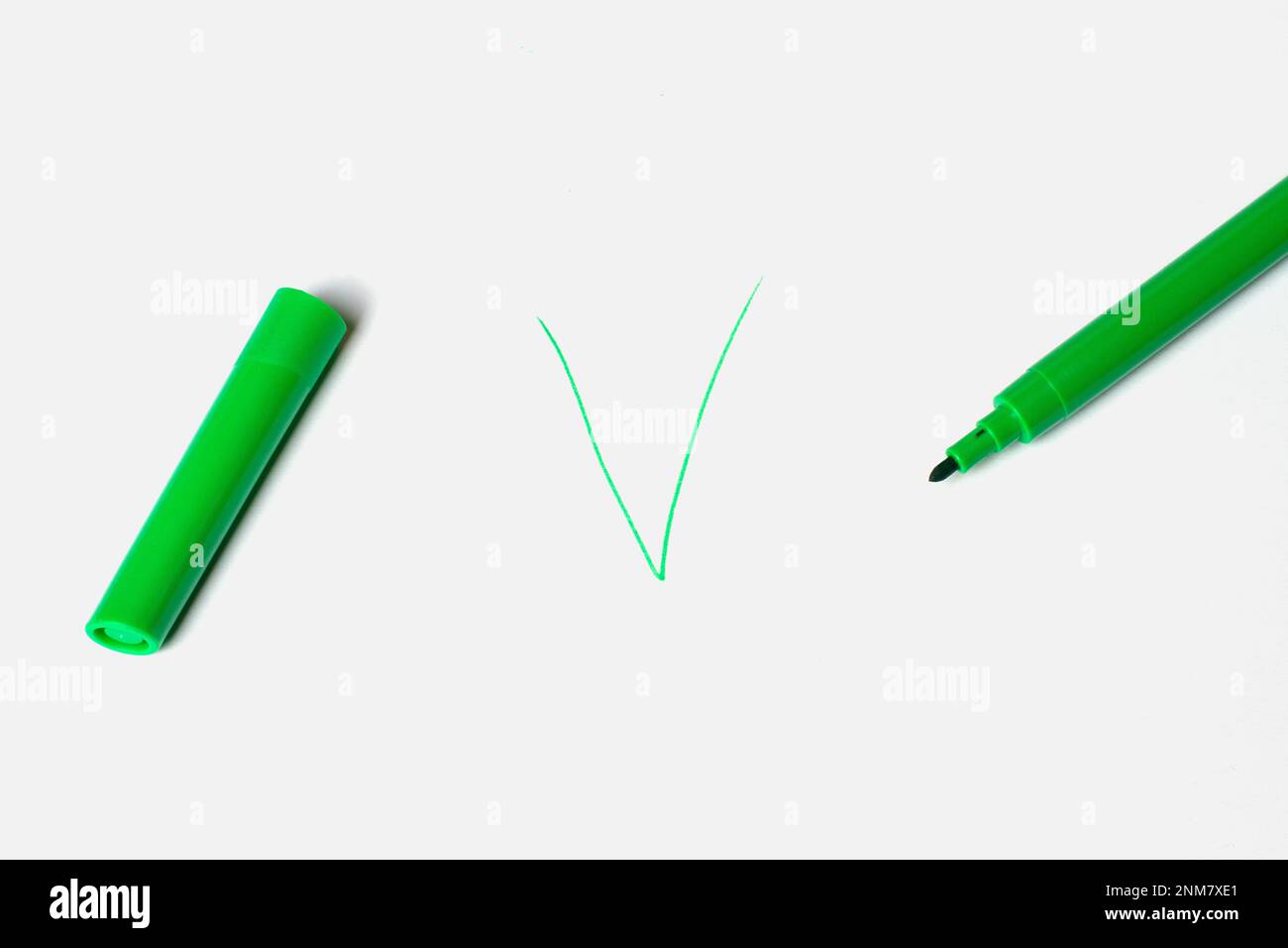 green marker with a cap. On a white background. Seal of approval. OK ...