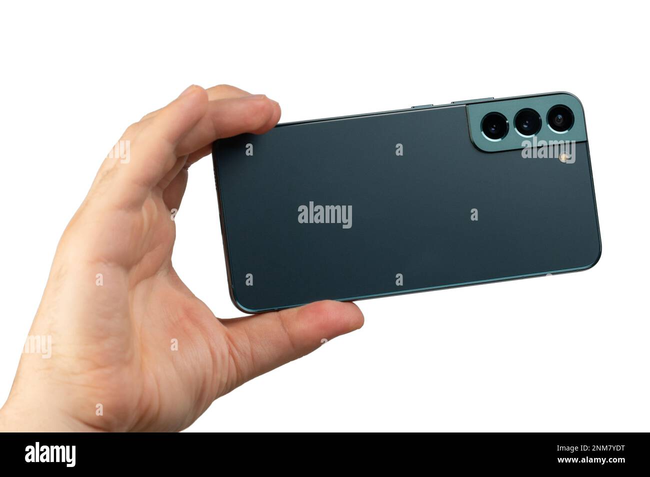 Take photo with smartphone back view in hand isolated on white studio ...