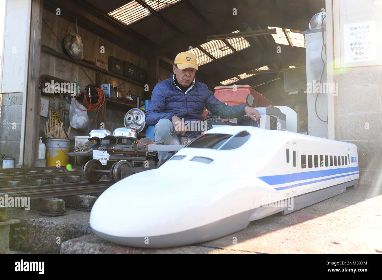 Visitors ride mini-SL (Steam Locomotive) and shinkansen bullet train at ...
